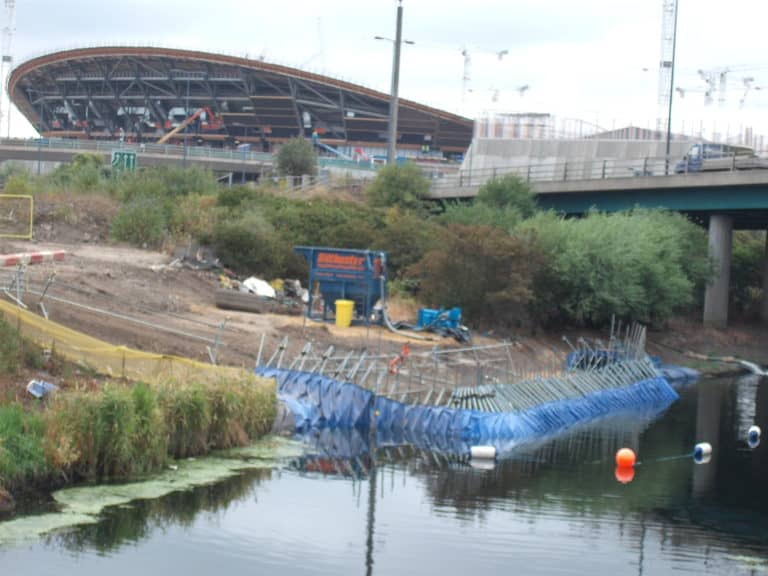 Outfall into a river using a Portadam temporary dam system - OnSite ...