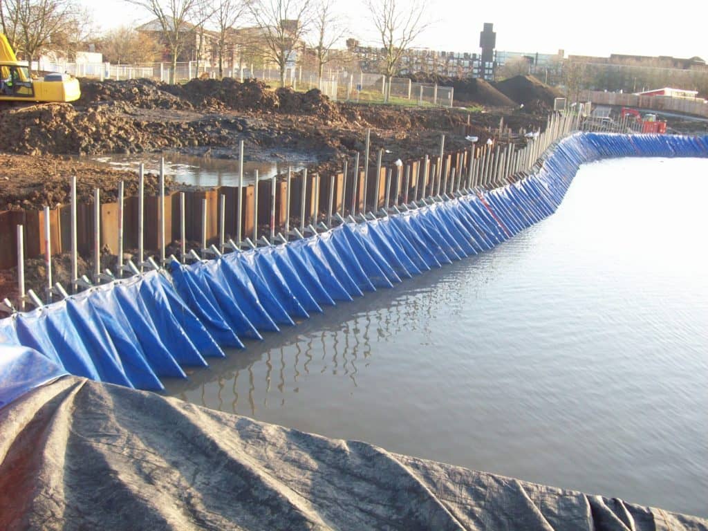 Portadam tempoary dam system being used for bank work in a London Park ...