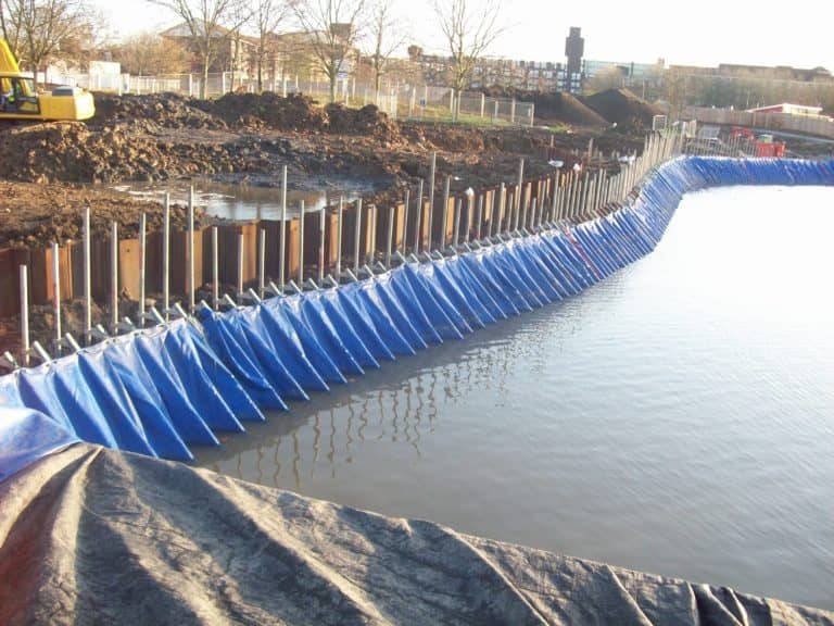 Portadam tempoary dam system being used for bank work in a London Park ...
